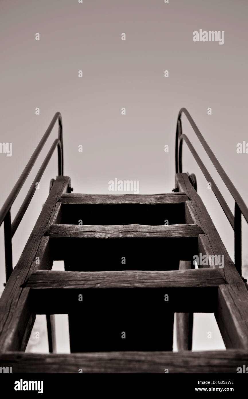 Steps of a slide on a playground Stock Photo - Alamy