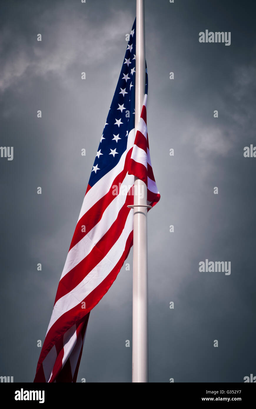 American flag and storm clouds Stock Photo - Alamy