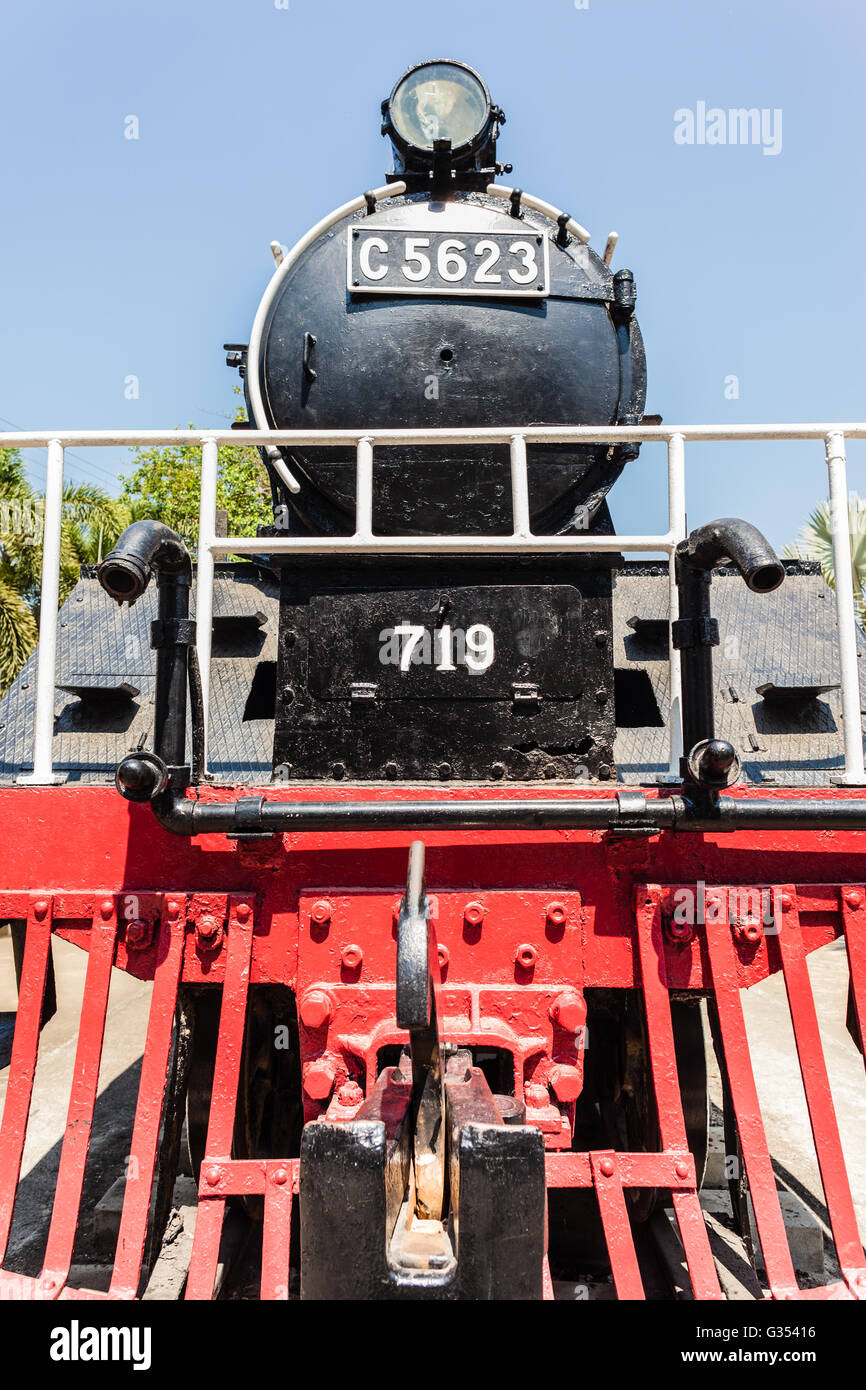 an ancient steam engine locomotive in kanchanaburi, Thailand, near the ...