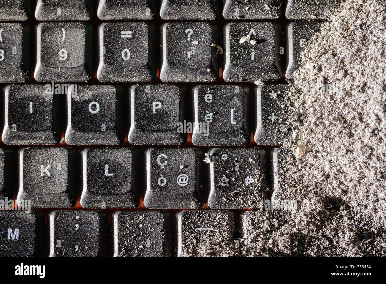 a dirty black keyboard covered in ash or dust Stock Photo - Alamy