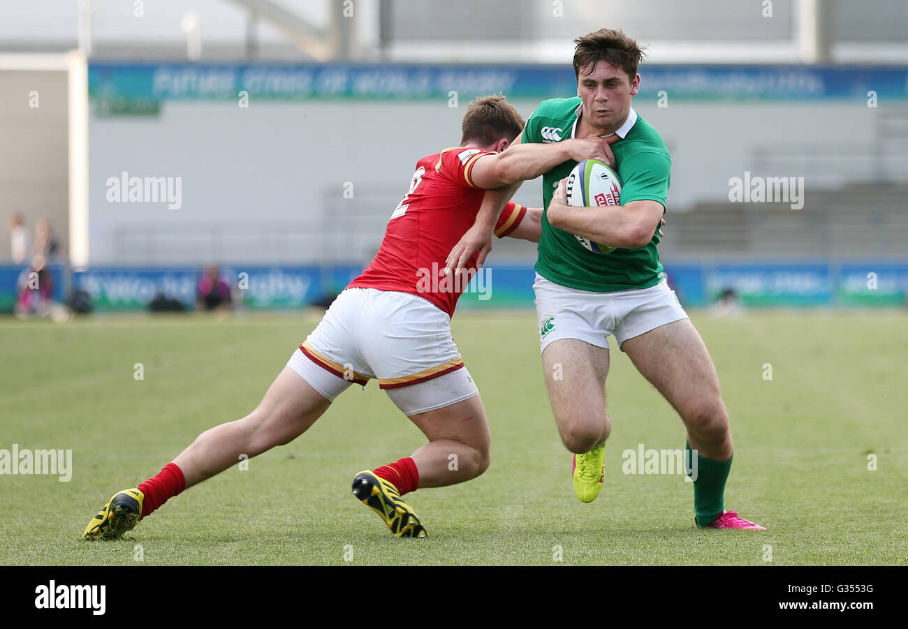 Ireland's Conor O'Brien gets past Wales Harri Millard during the Under ...