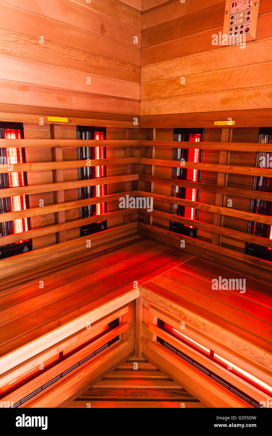 the interior of a small wooden infrarered sauna booth in a spa Stock ...