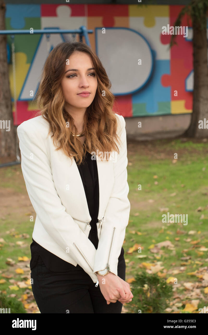 Portrait of a beautiful female model in autmn clothes outdoor.sensetive ...