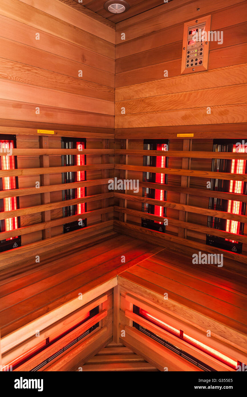 the interior of a small wooden infrarered sauna booth in a spa Stock ...
