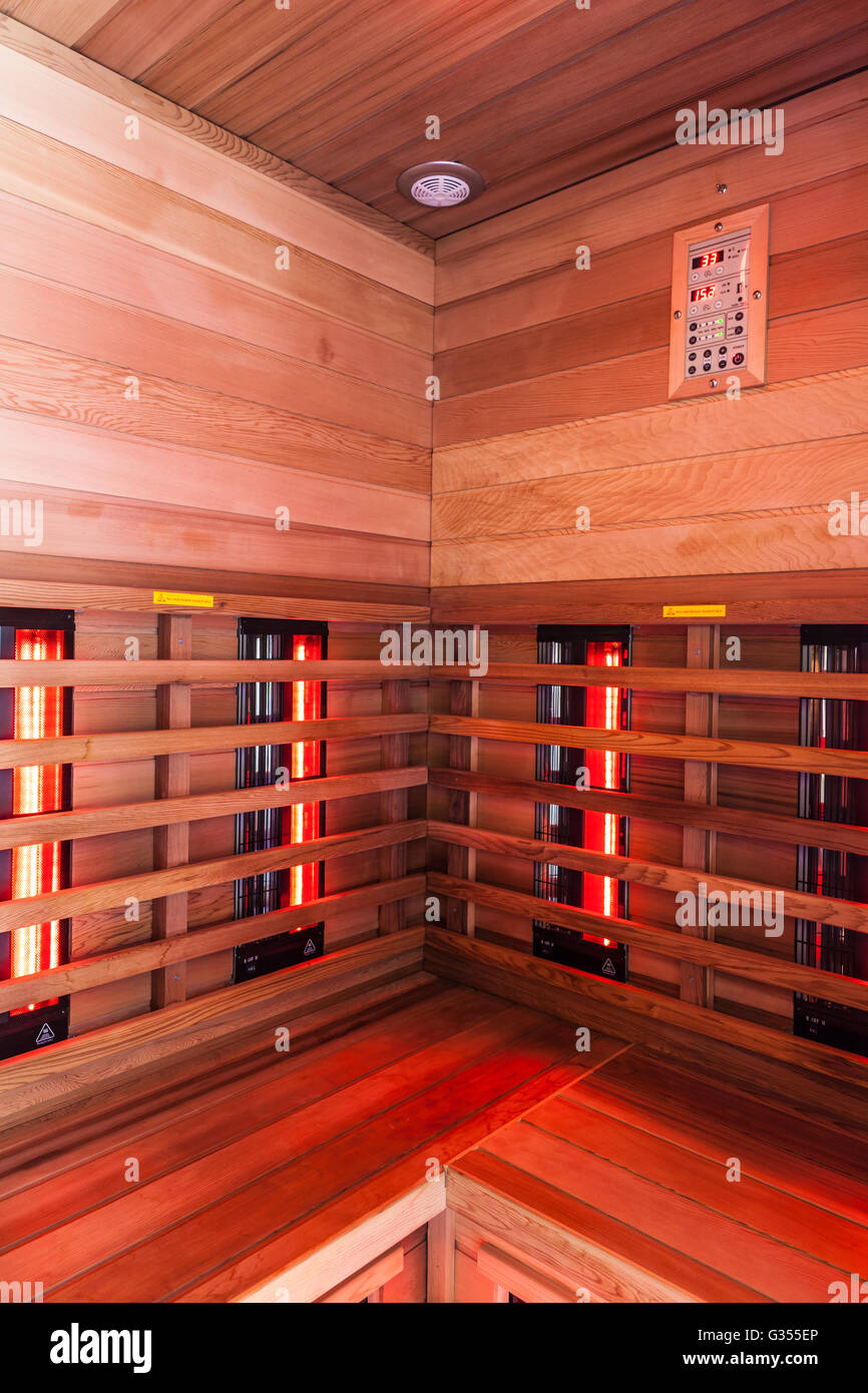 the interior of a small wooden infrarered sauna booth in a spa Stock ...