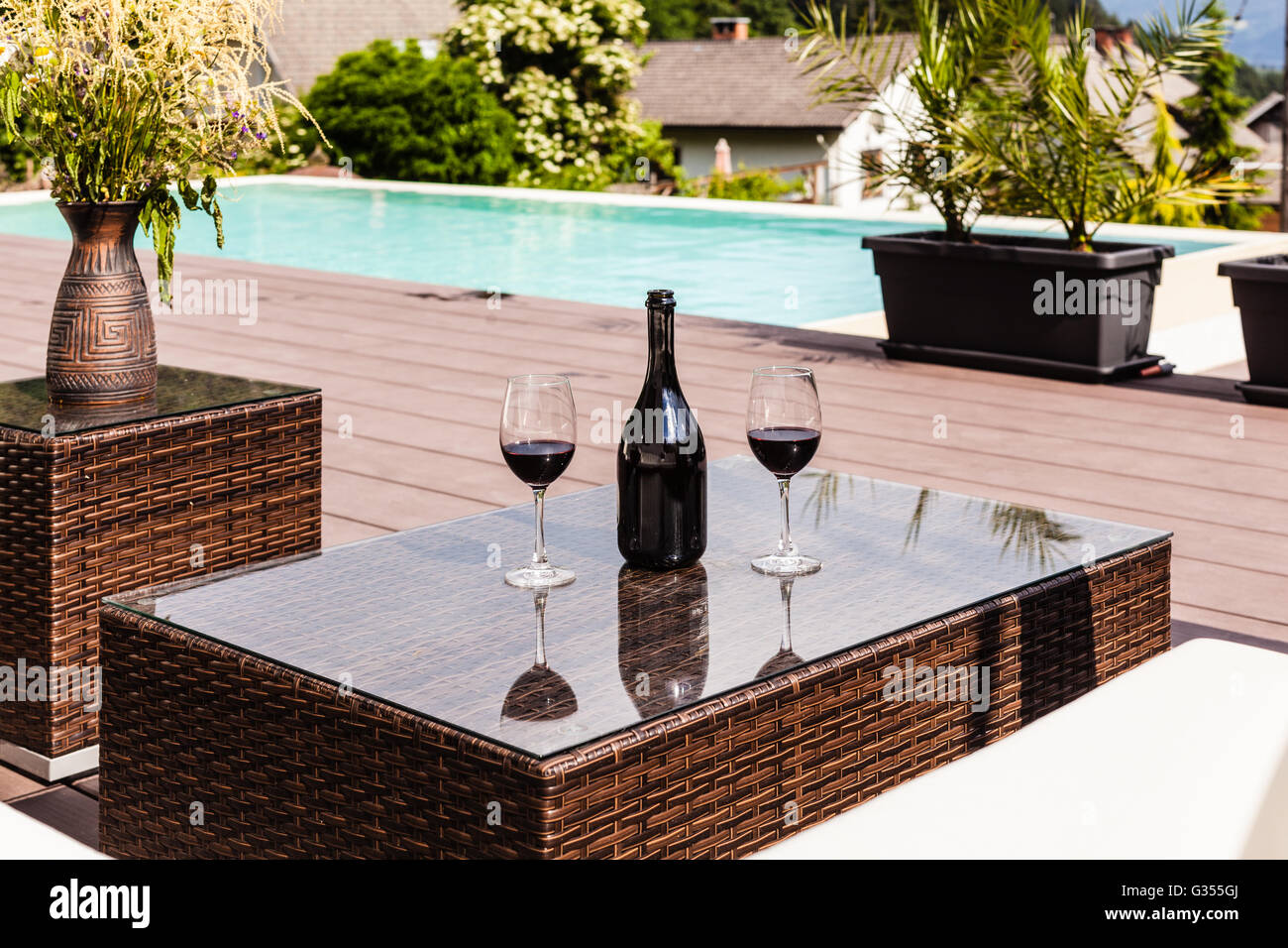 a luxurious lounge on the poolside of a beautiful big pool Stock Photo ...