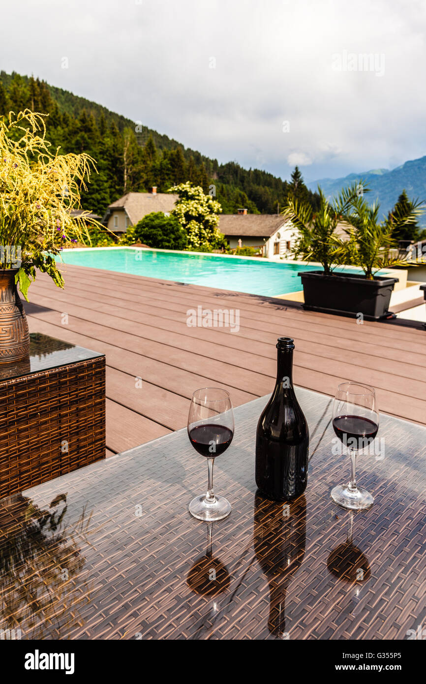 a luxurious lounge on the poolside of a beautiful big pool Stock Photo ...