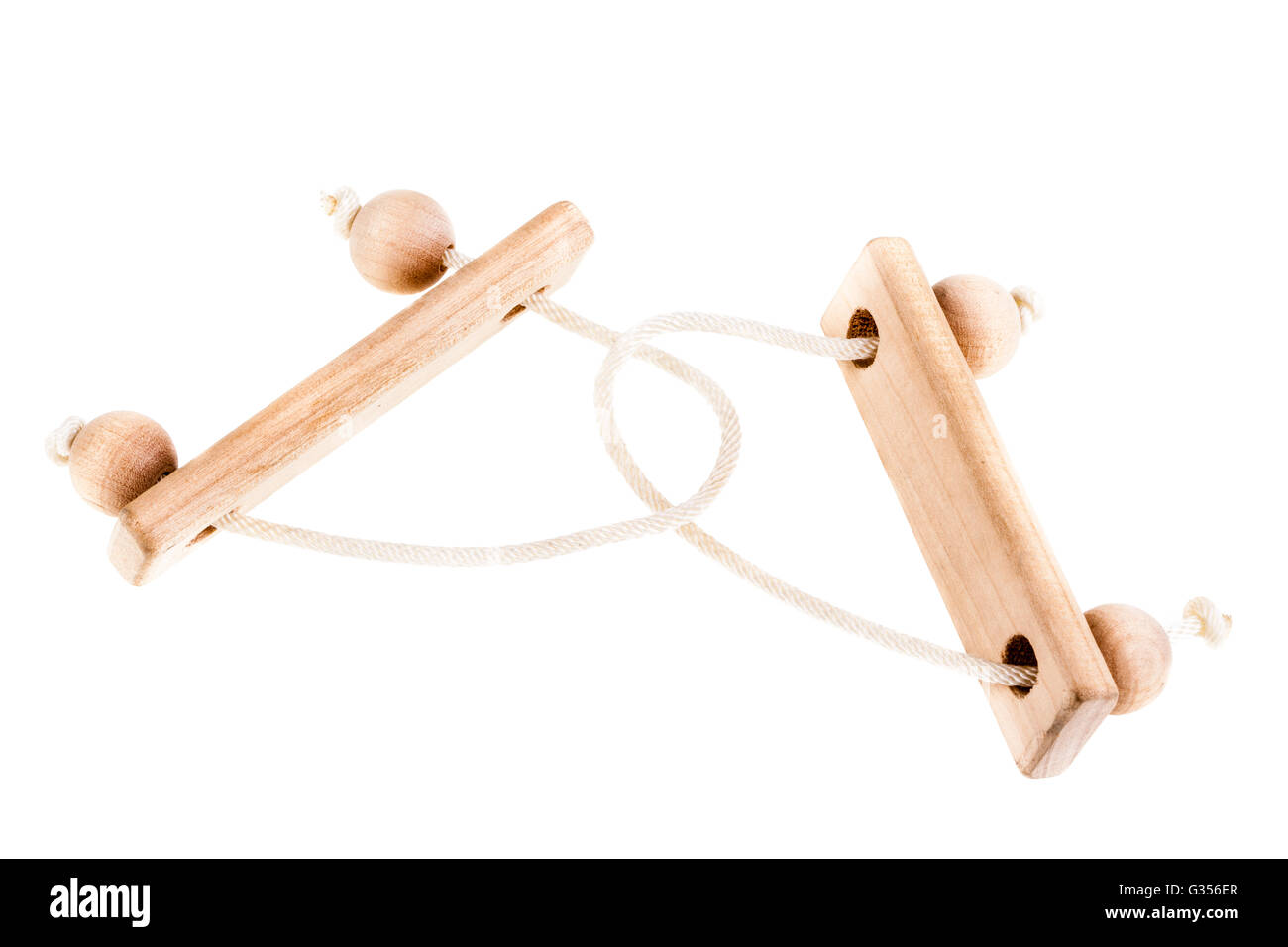 the double trouble string wooden puzzle isolated over a white ...