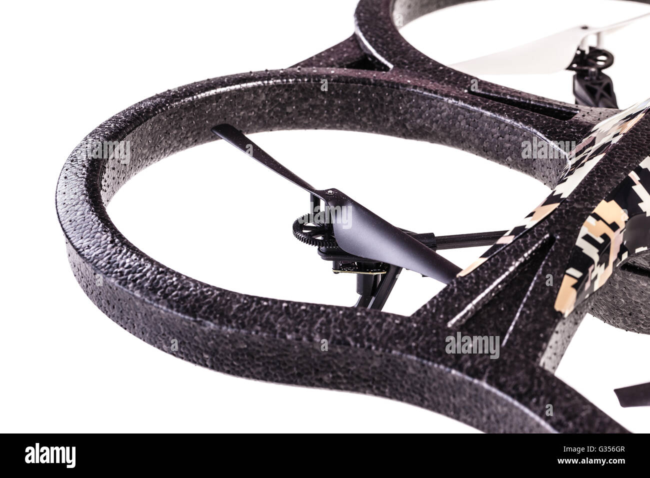 detail of a quad copter spy drone isolated over a white background ...