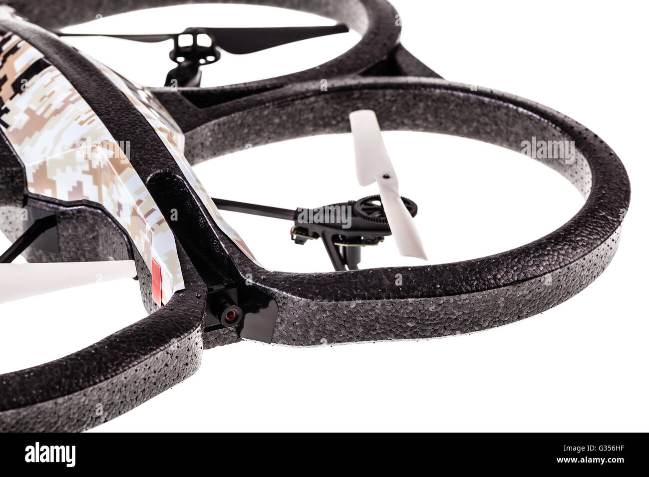 detail of a quad copter spy drone isolated over a white background ...