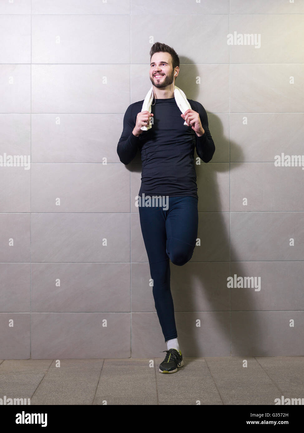 Jogger resting after running. Man runner taking a break during training ...