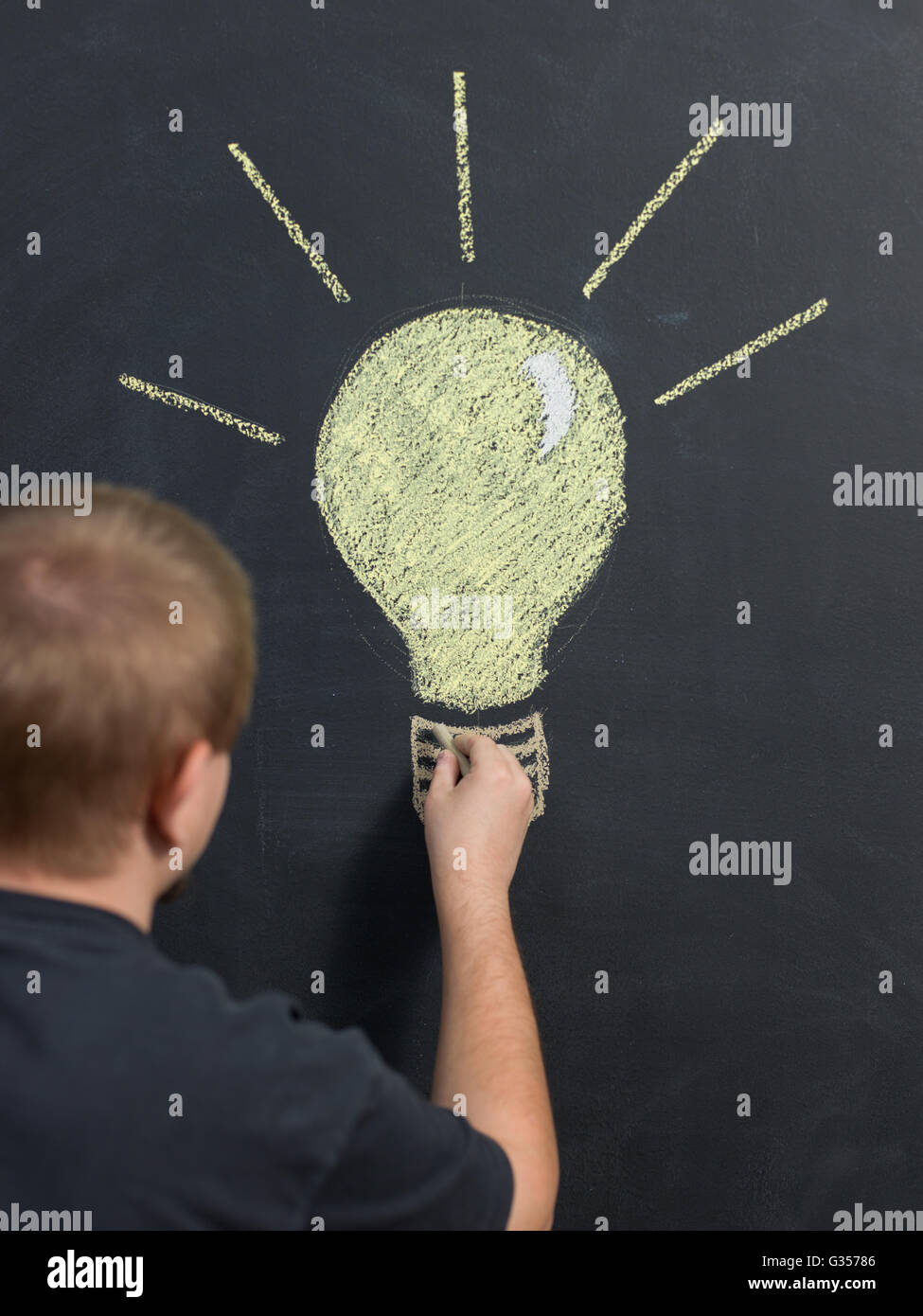 man with drawing lamp, idea concept Stock Photo - Alamy