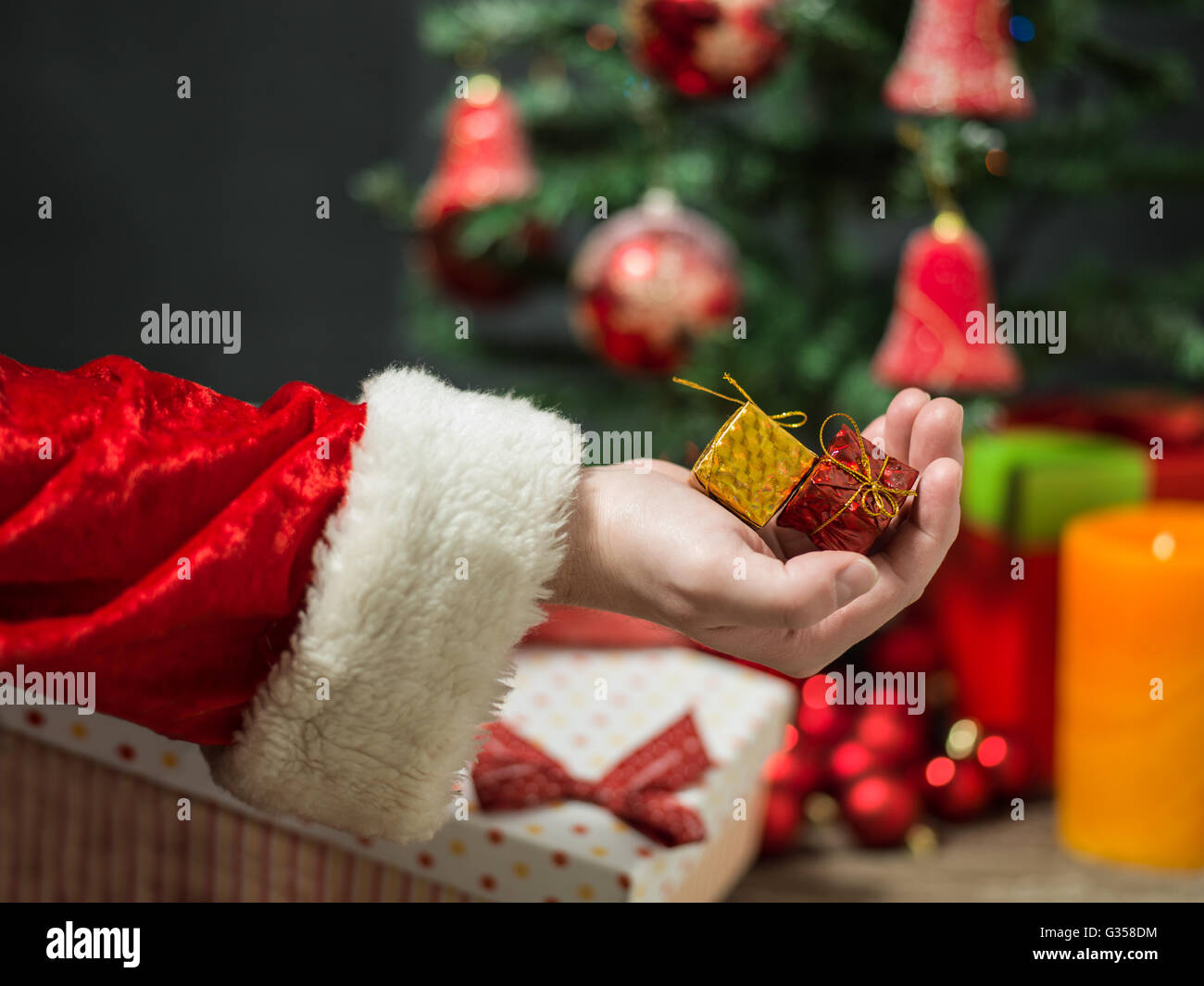 santa giving gift Stock Photo - Alamy