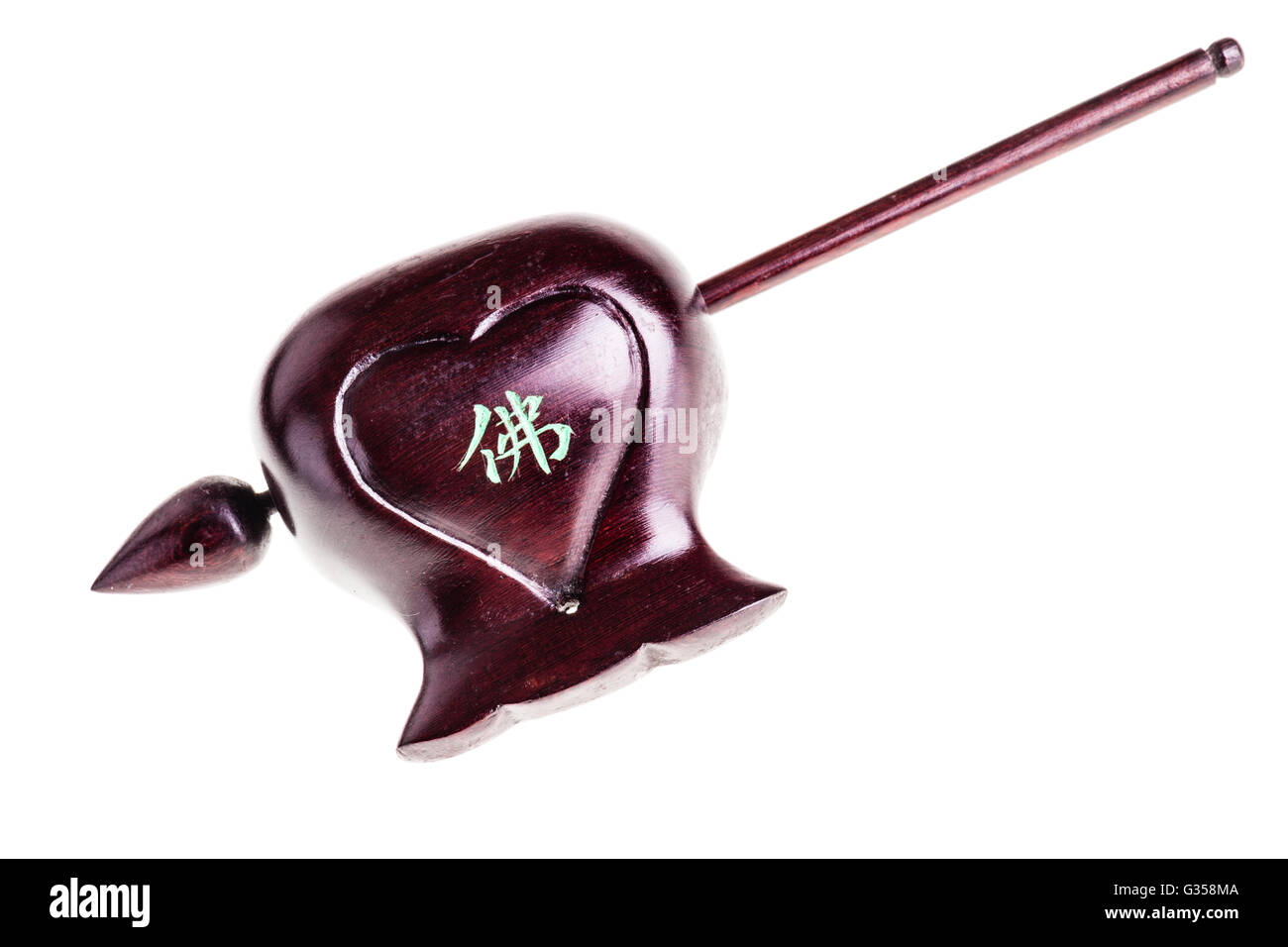 a wooden japanese traditional percussion instrument isolated over a ...