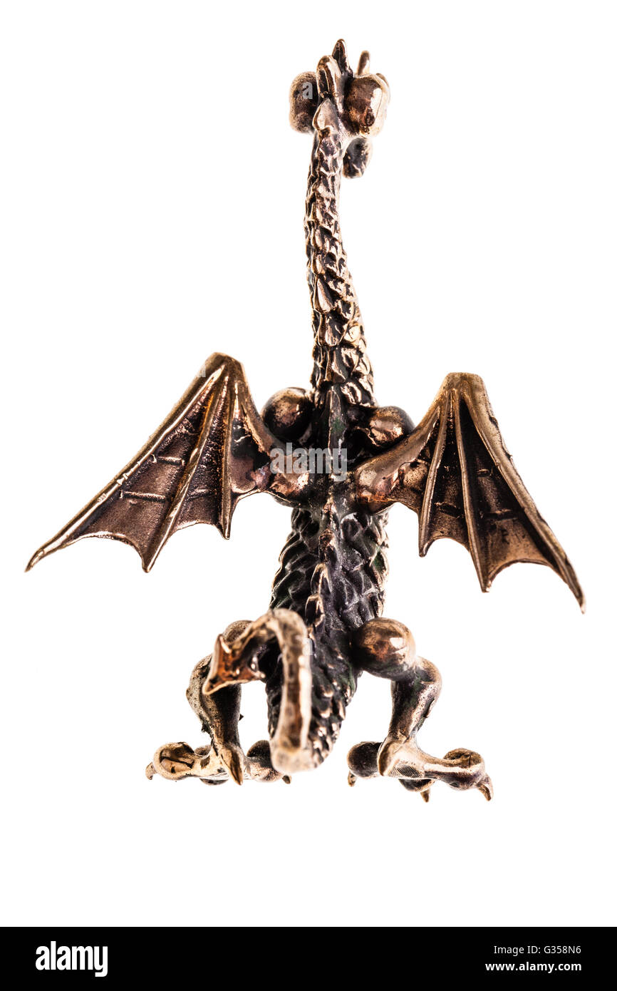 a bronze fantasy dragon figurine isolated over a white background Stock ...