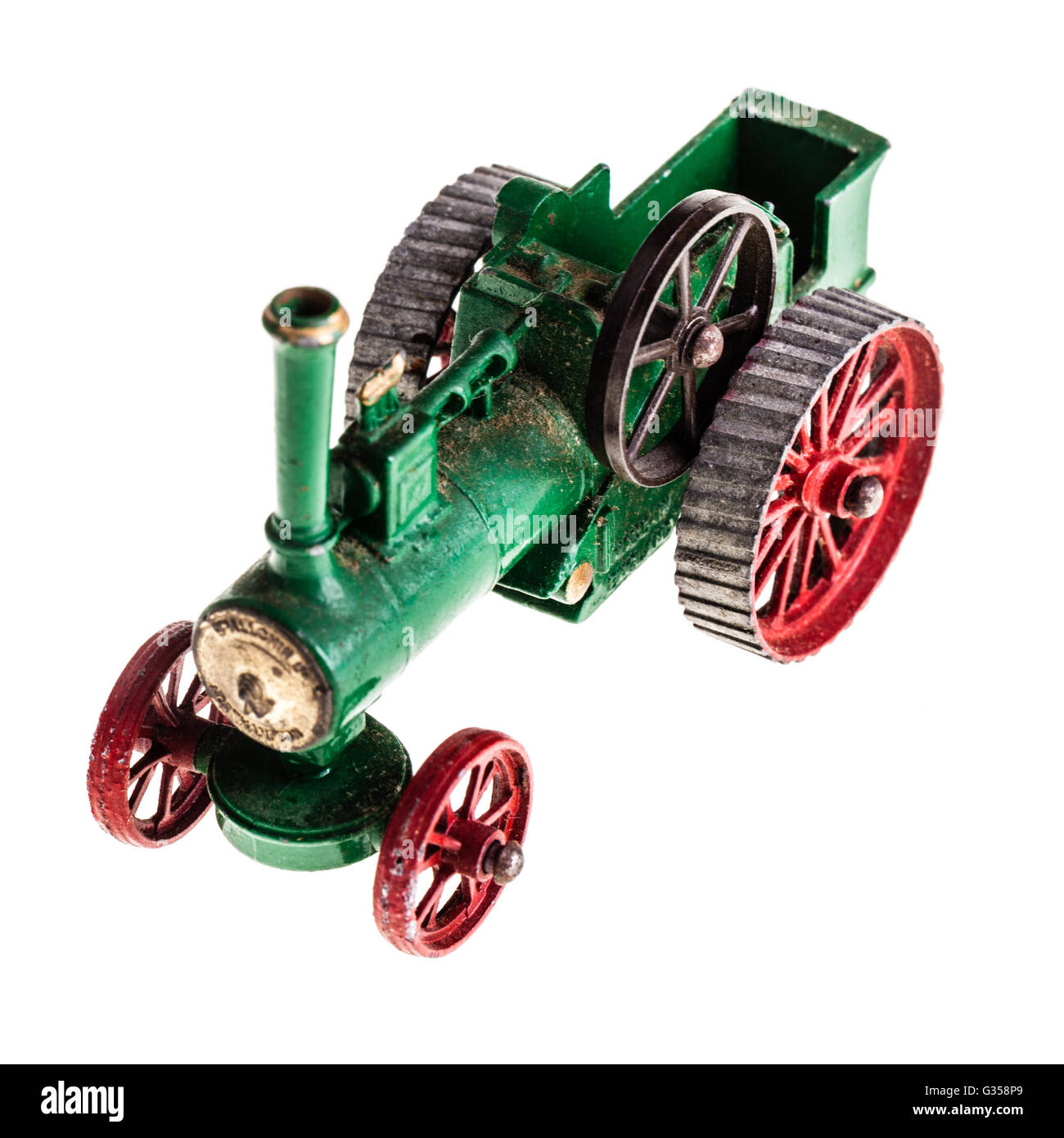 a metal model of a steam tractor isolated over a white background Stock ...
