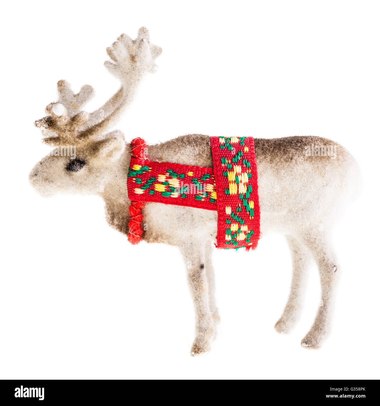 a small reindeer figurine isolated over a white background Stock Photo ...