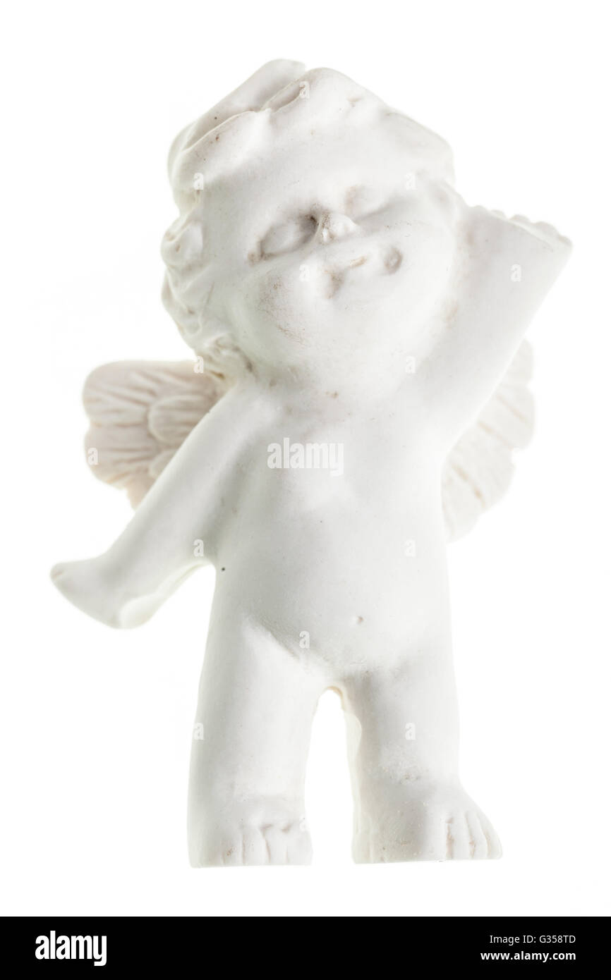 a small cute ceramic angel statuette isolated over a white background ...