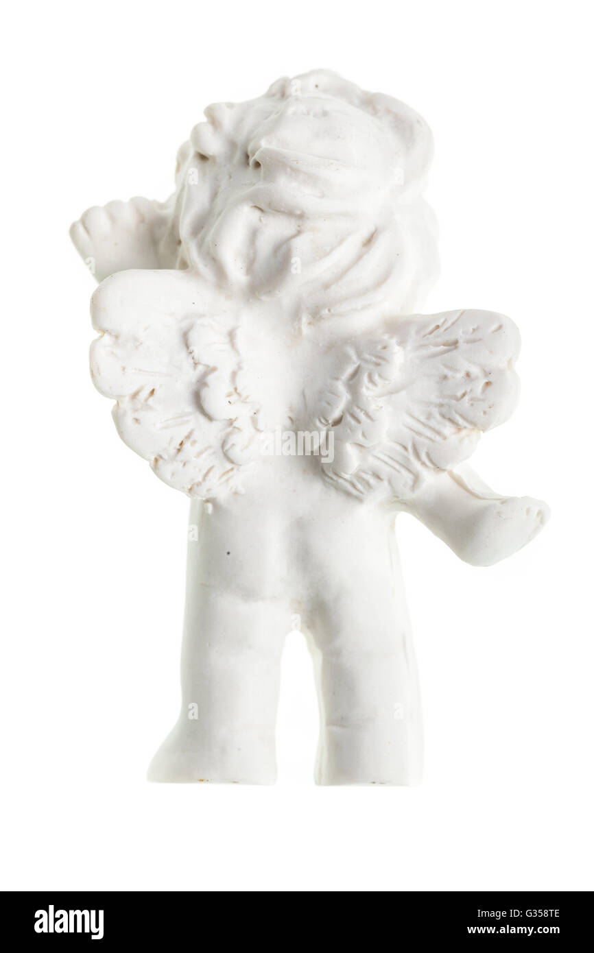 a small cute ceramic angel statuette isolated over a white background ...