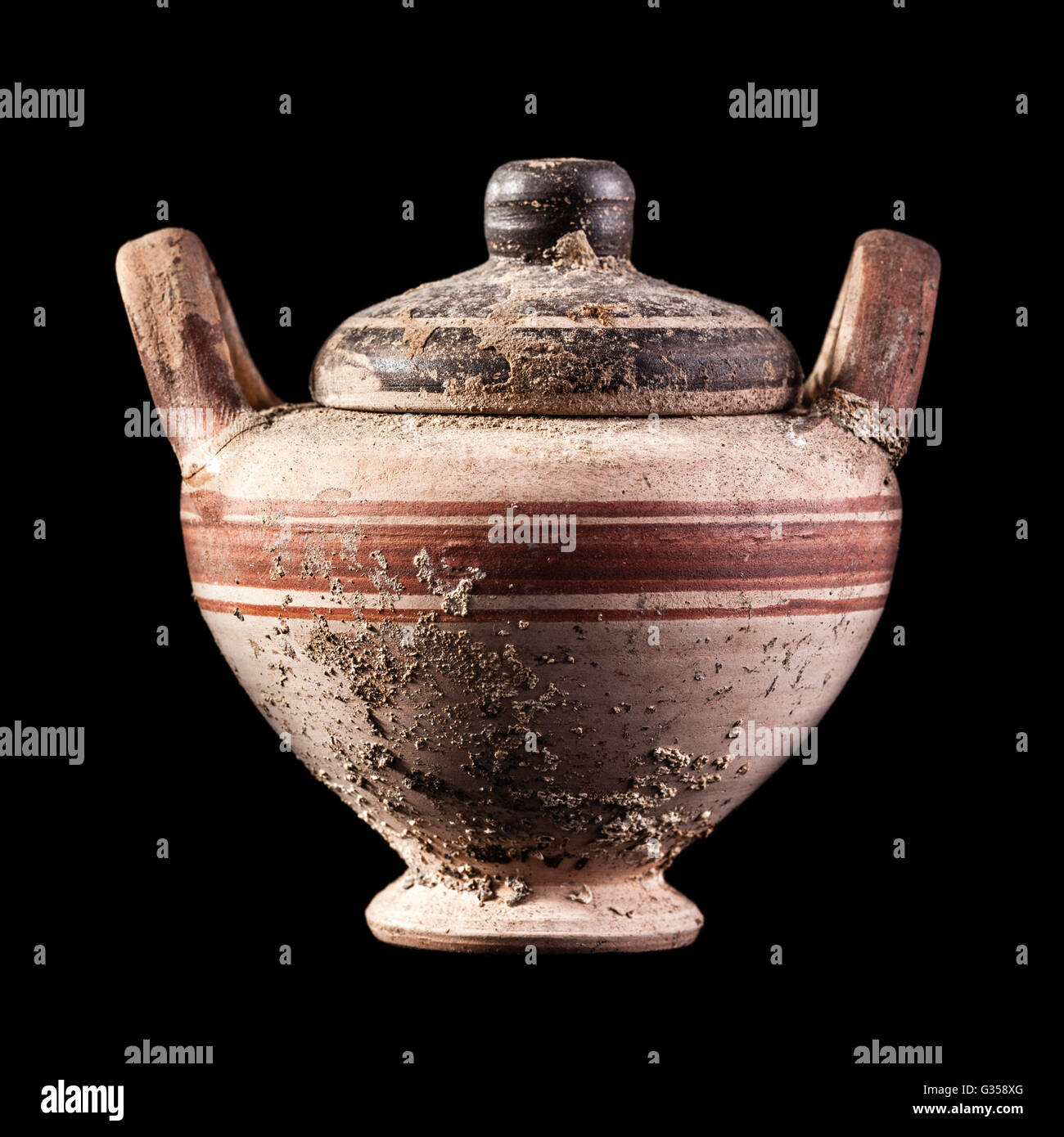 Apulian black pottery ancient Canosan cup-skiphos vase isolated over a ...