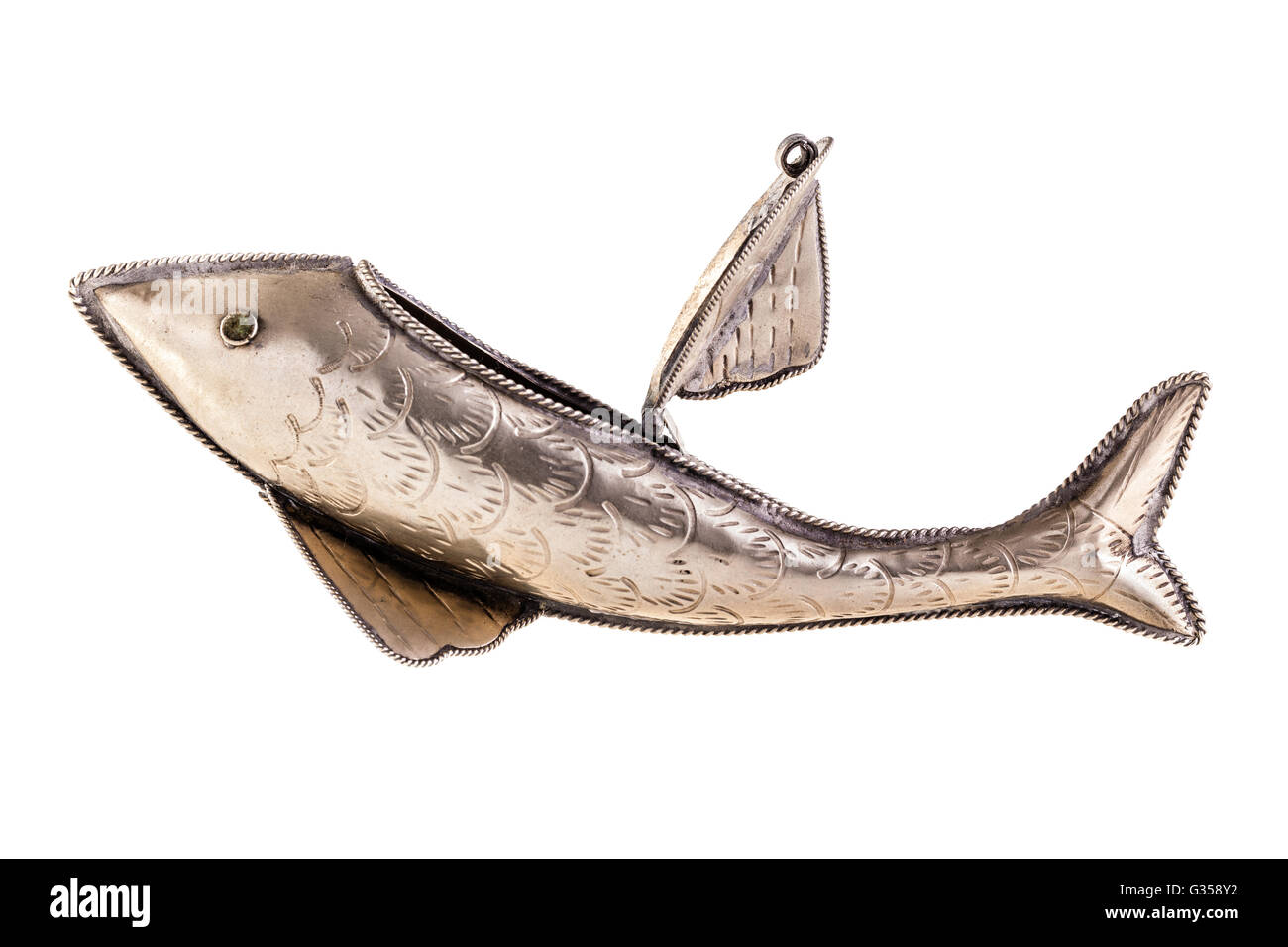 a metal fish shaped casket isolated over a white background Stock Photo ...
