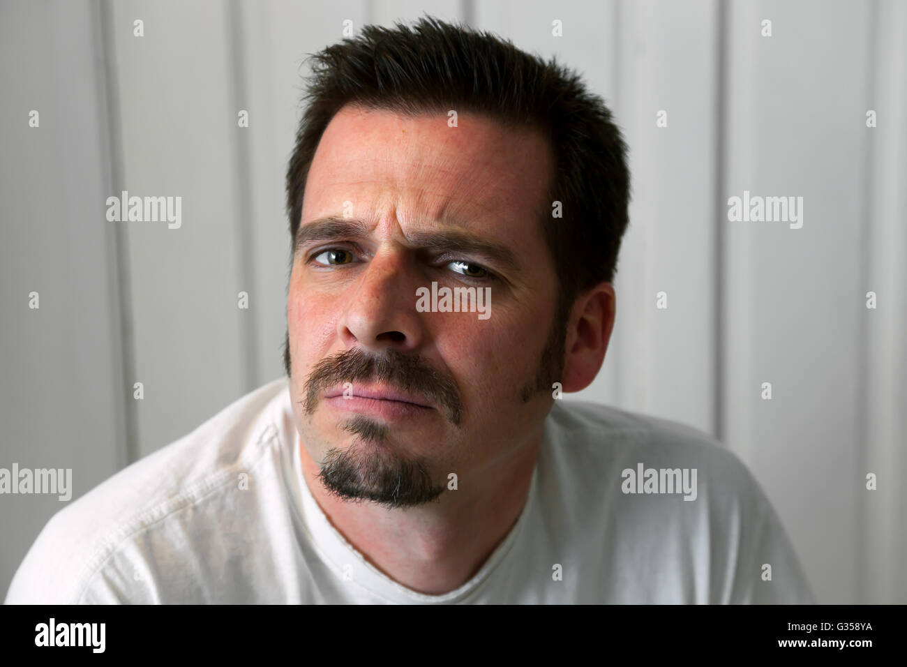 Scowls hi-res stock photography and images - Alamy