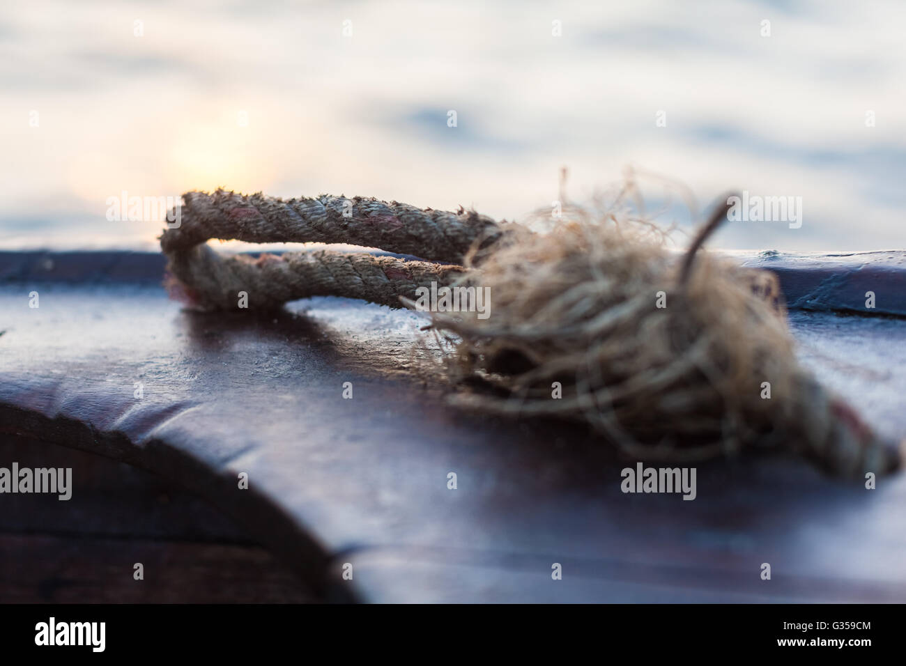 detail of an old worn rope on a thai wooden boat Stock Photo - Alamy