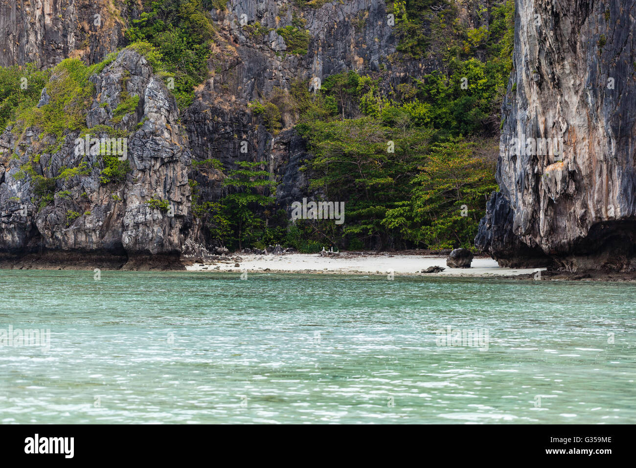 a beautiful an secluded cove in the exotic phi phi tropical island ...
