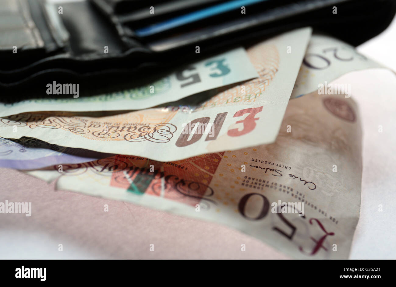 Five pound notes in a wallet hi-res stock photography and images - Alamy