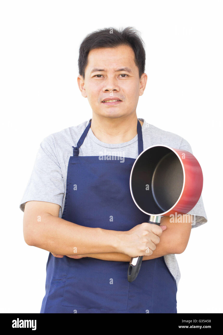 Asian Man Cross His Arm With Cooking Tool Stock Photo - Alamy