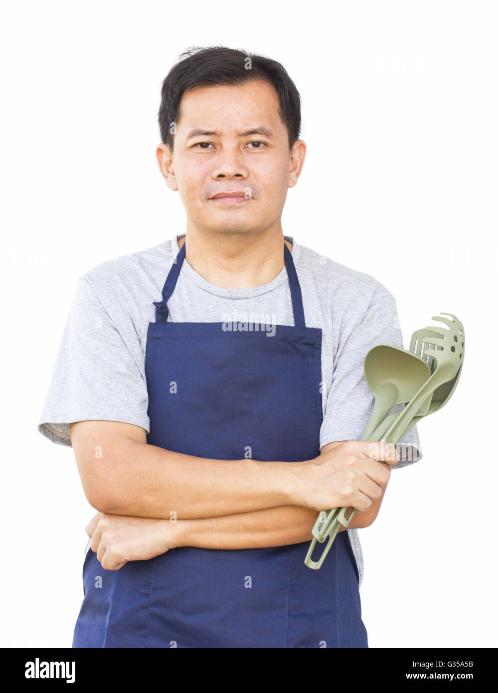 Asian Man Cross Arm With Cooking Tools Stock Photo - Alamy