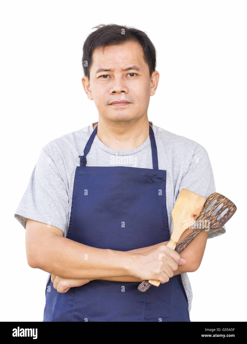 Asian Man Cross Arm With Cooking Tools Stock Photo - Alamy