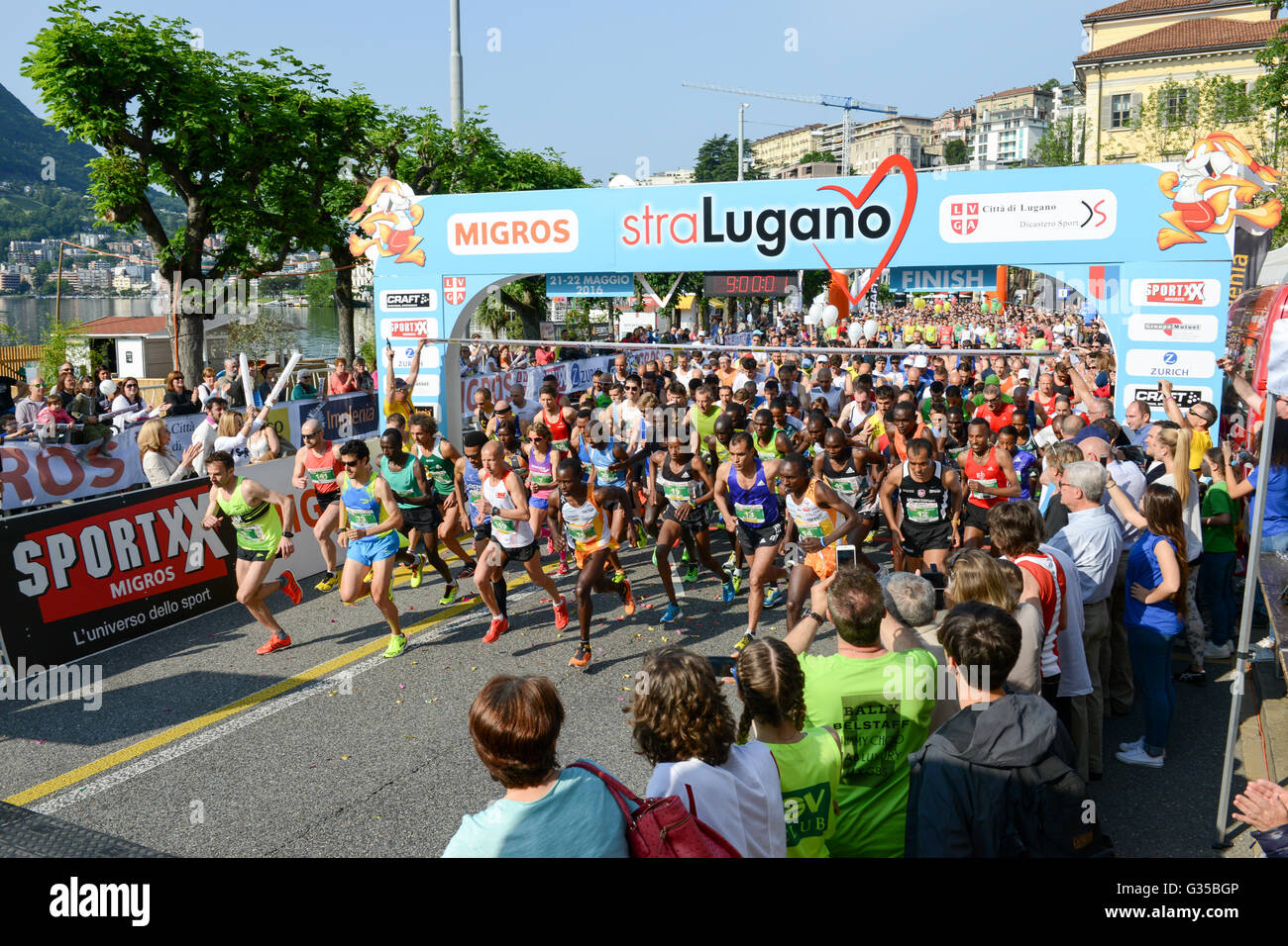 Lugano, Switzerland - 22 may 2016: Marathon runners packed tightly ...