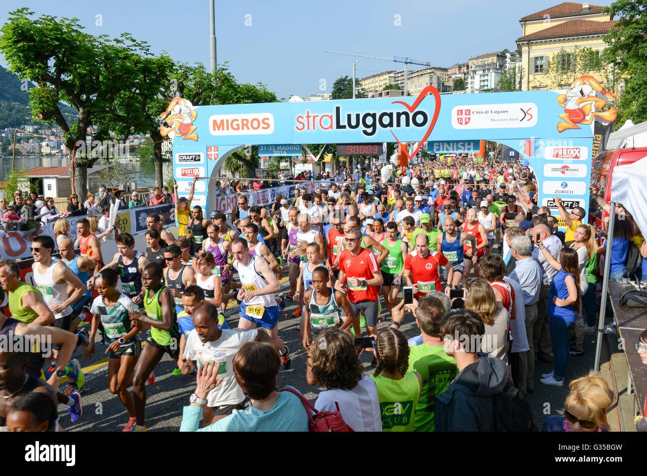 Lugano, Switzerland - 22 may 2016: Marathon runners packed tightly ...