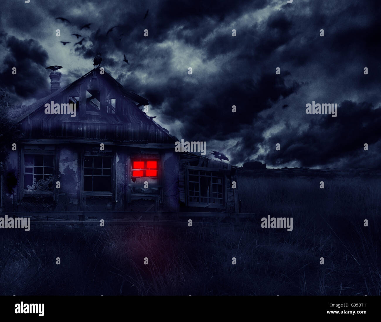 Old abandoned house with ghosts in the field Stock Photo - Alamy