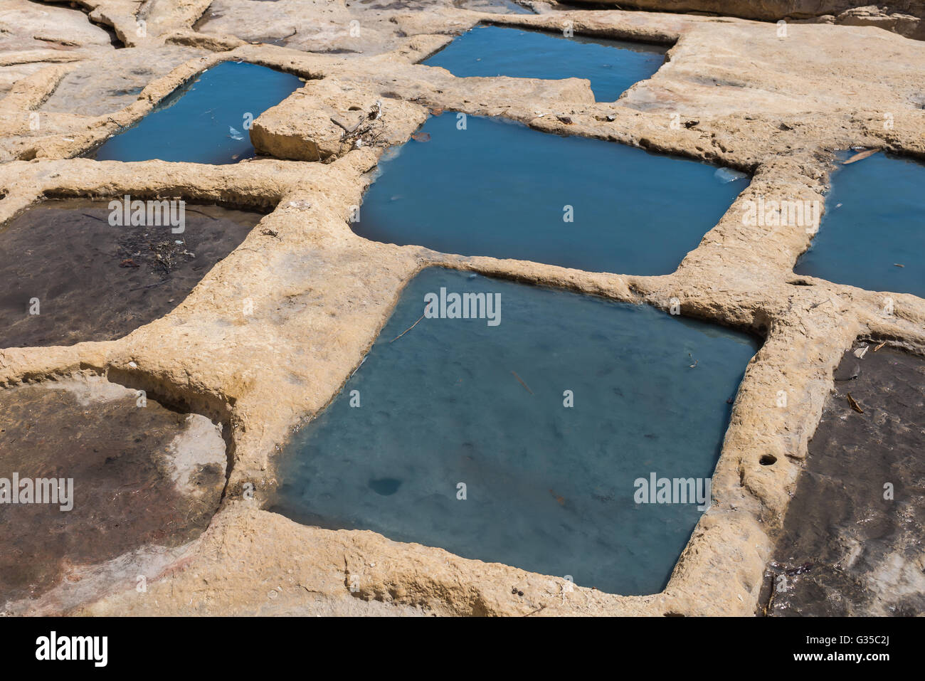 Holes in rocks at the seaside of the Mediterranean sea, for evaporation ...