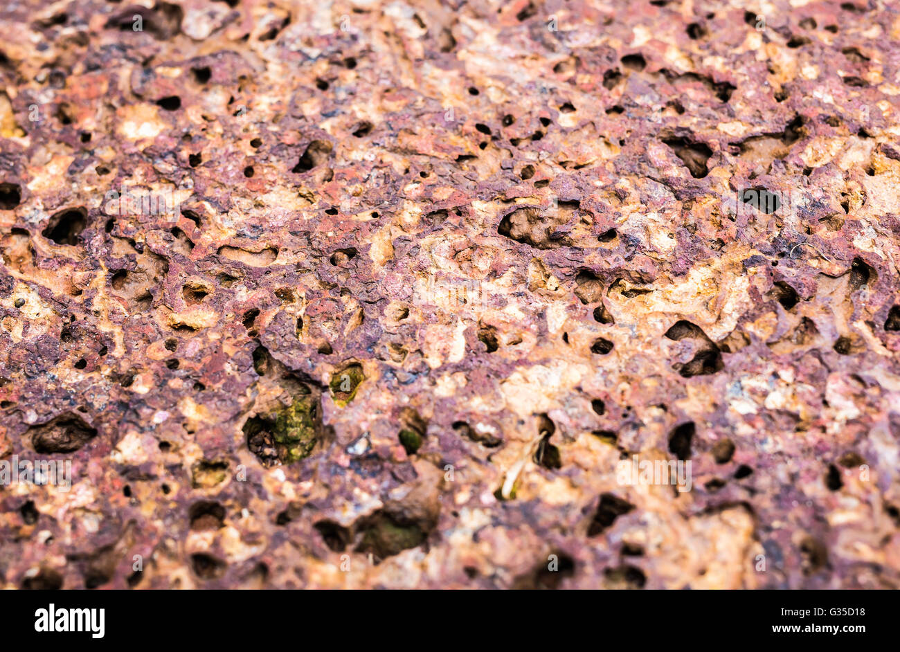 Stone texture of warm colours Stock Photo - Alamy
