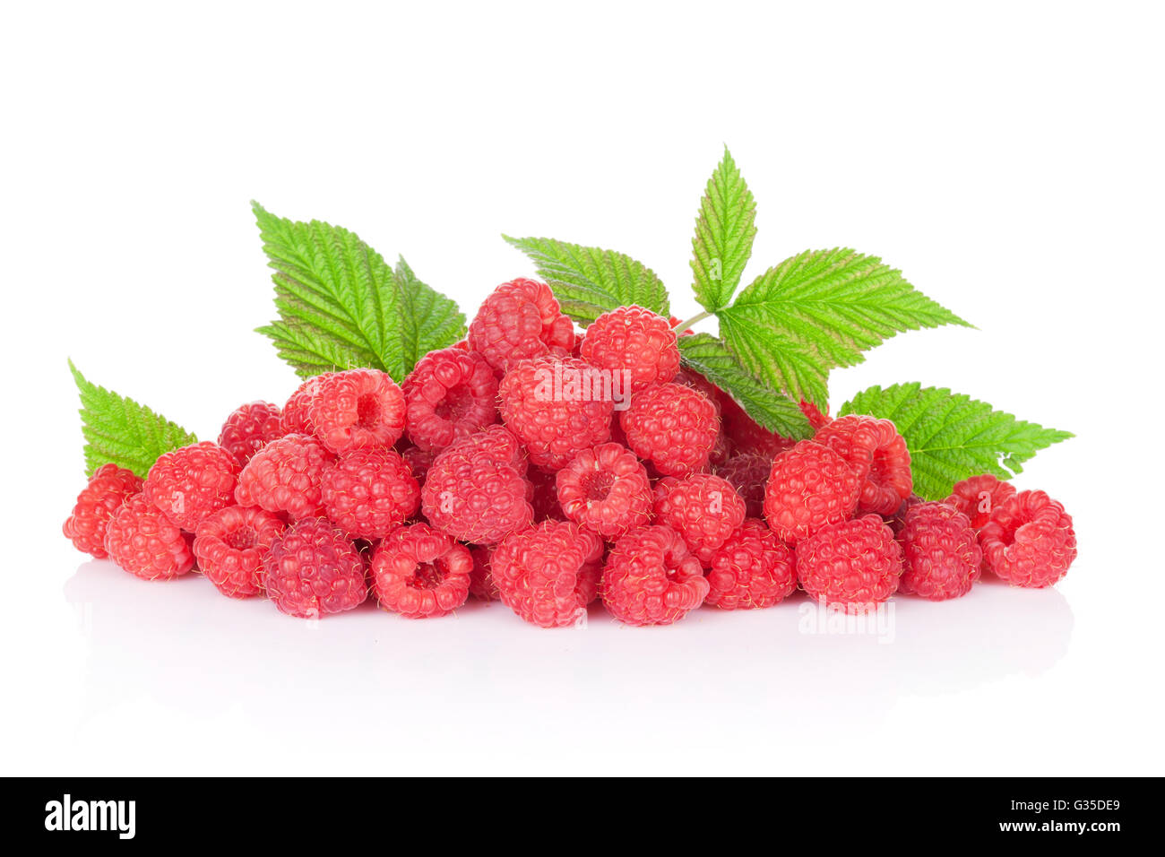 Heap of fresh raspberries. Isolated on white background Stock Photo - Alamy