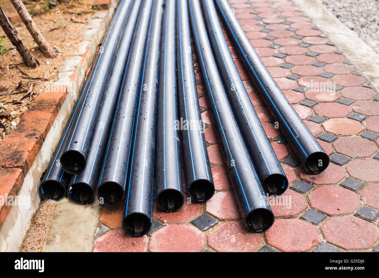 background of colorful big plastic pipes Stock Photo - Alamy