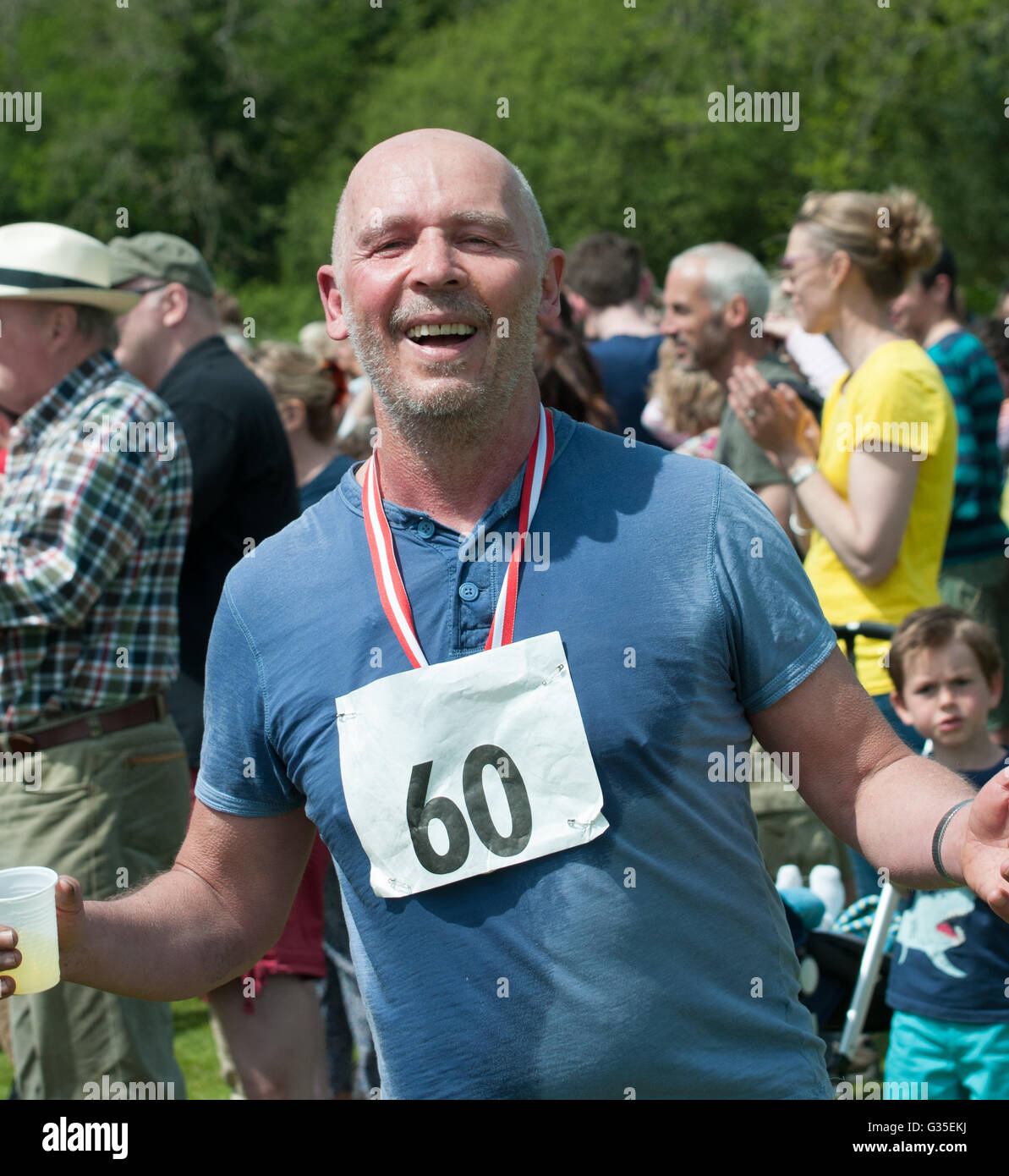 60 yr old adult completes fun run Stock Photo - Alamy