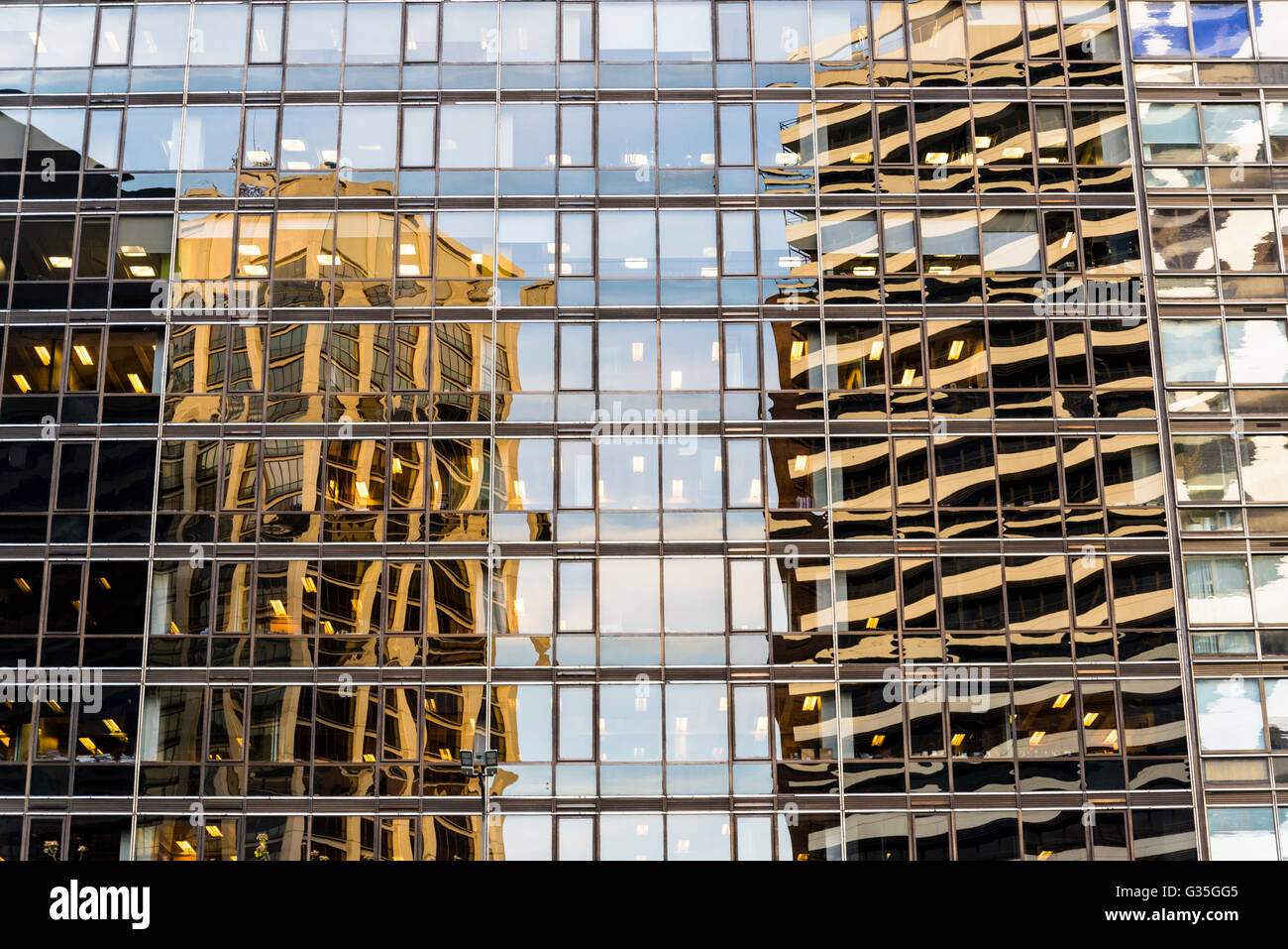Reflections in glass building Stock Photo - Alamy