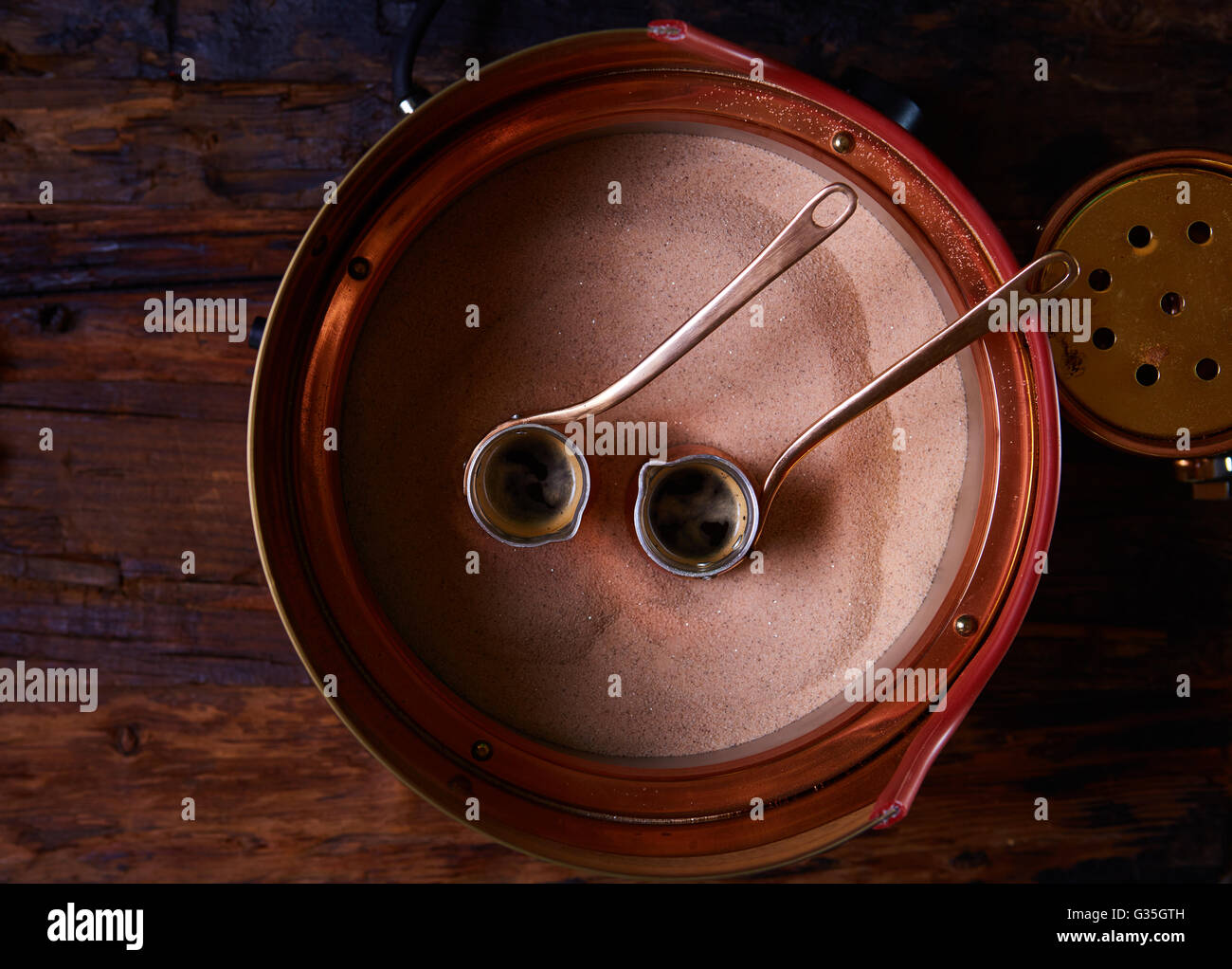 Two cute pots to prepare Turkish coffee Stock Photo - Alamy