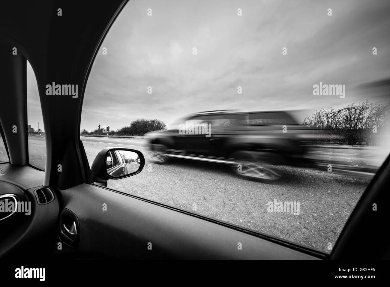Vehicle passes by hi-res stock photography and images - Alamy