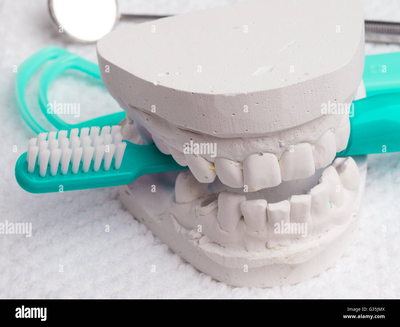 Oral hygiene health concept. Closeup blue toothbrush mirror and tongue ...