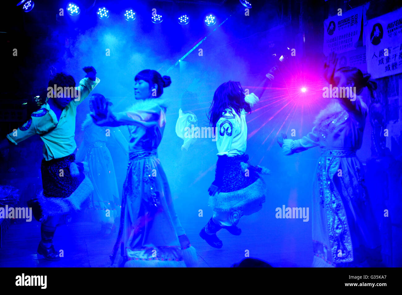 CHINA, Yunnan, Lijiang, music and dance performance in bar for chinese ...