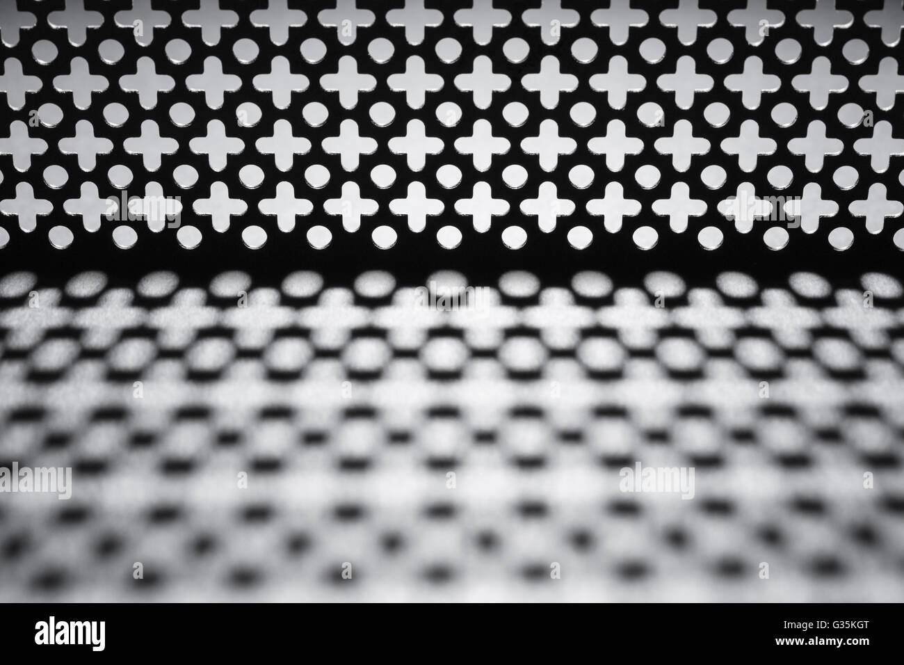 Steel mesh and shadows Stock Photo - Alamy