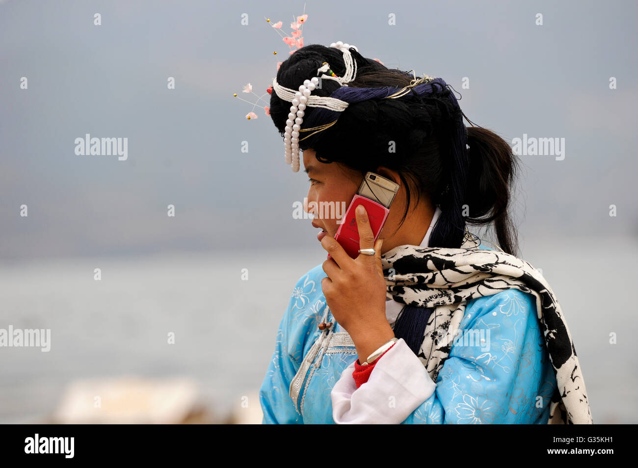 CHINA Yunnan Lugu Lake , ethnic minority Mosuo who are buddhist and ...