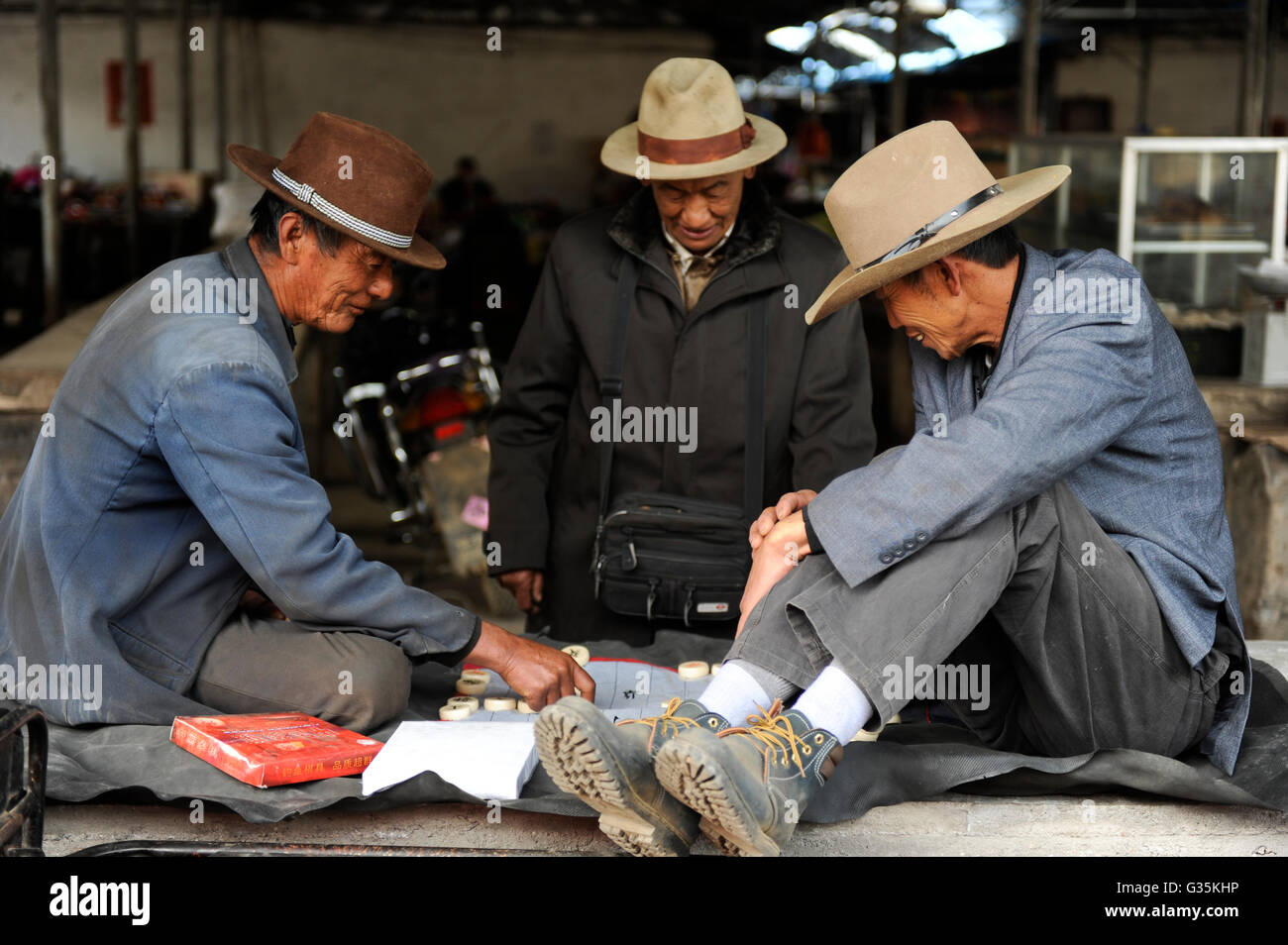 CHINA Yunnan Lugu Lake , ethnic minority Mosuo who are buddhist and ...