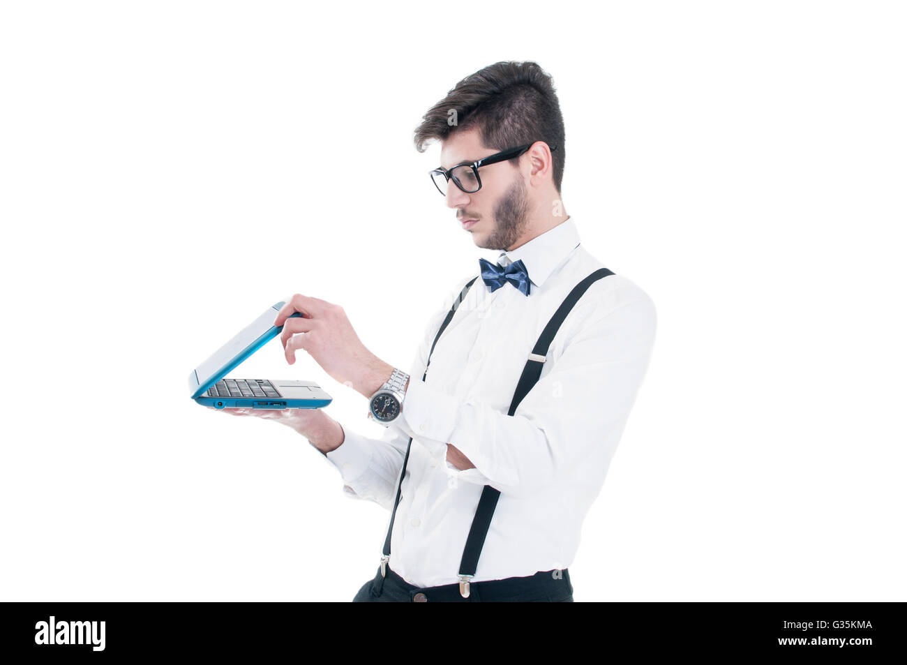 Young businessman looking at his laptop with disappointment. Isolated ...