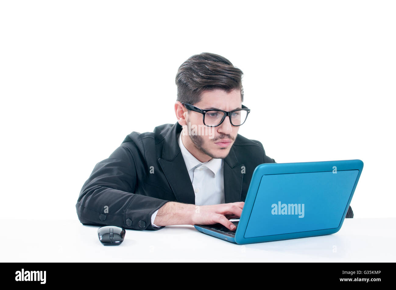 Young business man looking at his laptop with disappointment. Isolated ...